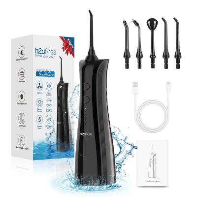 China Portable Oral Irrigator Cordless Dental CE with 300ml Water Tank Capacity and ABS Plastic Material for sale