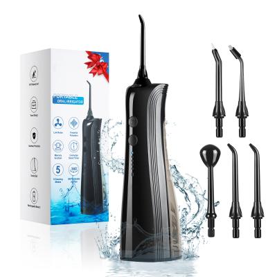 China Portable Dental Water Flosser with 300ml Capacity and 1200-1400 pulse/min Frequency for sale