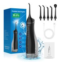 China Home Travel Portable Water Flosser 310ML 4 Modes IPX7 Waterproof Electric Teeth Cleaning Device for sale
