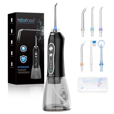 China Oral Irrigator Cheap Wholesale IPX7 Waterproof Electric Teeth Cleaning Device Home Travel Dental Floss Water Flosser for sale