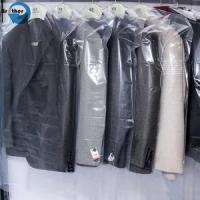 China Disposable Garment Cover Bag Clear Standard Dry Cleaner Bag on Roll Printed with Safety Warning Word for sale
