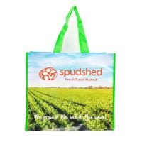 China Full Printing Cross Stitched PP Woven Shopping Bag with Mesh Pocket for sale