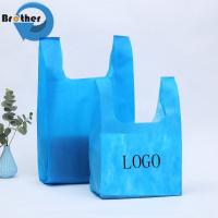 China Custom Recycle Eco PP Spunbond T-Shirt Handle Reusable Nonwoven Vest Shopping Tote Non Woven Fabric Carry Bags for sale
