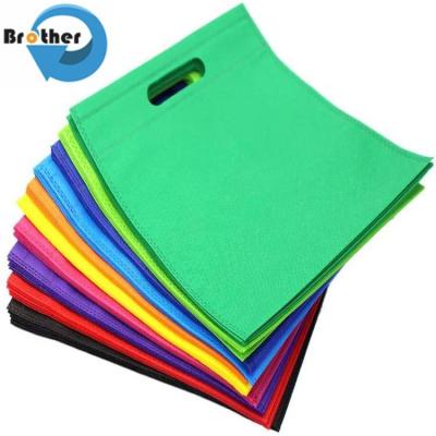 China Custom Recycle Eco PP Spunbond T-Shirt Handle Reusable Nonwoven Vest Shopping Tote Non Woven Fabric Carry Bags for sale