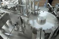 China Automatic Syringe Filling Machine 2 Head 1200-1600 p/h for 0.5-10ML Syringes for sale