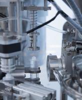 China High Speed Aseptic Syringe Filling Machine 2100-2350 pc/h for 0.5-80ml Prefilled Syringes for sale