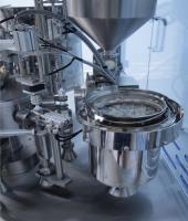 China High Speed Aseptic Syringe Filling Machine 2100-2350 pc/h for 0.5-80ml Prefilled Syringes for sale