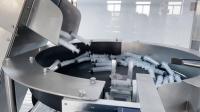 China High Accuracy Prefilled Syringe Filling Machine 2100-2350 pc/h Capacity with Ceramic Pump for 0.5-80ml Syringes for sale
