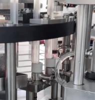 China HIJ-DZA200 Automatic Syringe Filling Machine 3000-3900 p/h Capacity for 1-50ml Plastic Syringes for sale