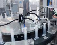 China HIJ-DZA200 Automatic Syringe Filling Machine 3000-3900 p/h Capacity for 1-50ml Plastic Syringes for sale
