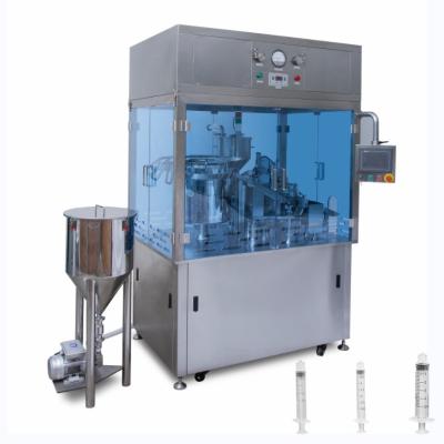 China Advanced Automatic Disposable Plastic Syringe Filling And Capping Machine For Gel And Cream for sale