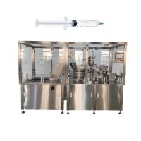 China Automatic Syringe Filling Machine 220V 1800-2100 p/h for Cosmetic Veterinary Use Plastic Syringes Filler for sale