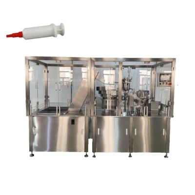 China Automatic Syringe Filling and Plugging Machine 0.5-80ml 1800-2100 p/h CE Certified for sale