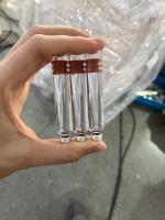 China Desktop Aseptic Syringe Filling Machine with Laminar Flow Frame for sale