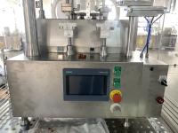 China Desktop Aseptic Syringe Filling Machine with Laminar Flow Frame for sale