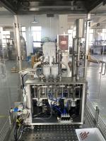 China Desktop Aseptic Syringe Filling Machine with Laminar Flow Frame for sale