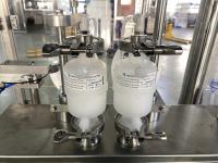 China Desktop Aseptic Syringe Filling Machine with Laminar Flow Frame for sale