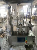 China Desktop Aseptic Syringe Filling Machine with Laminar Flow Frame for sale