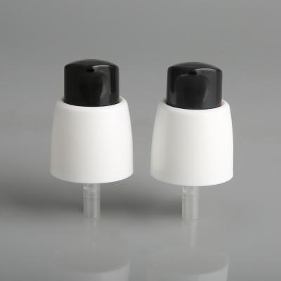 China 20mm Lotion Dispenser Bottle with White Cream Pump and Over Cap for sale