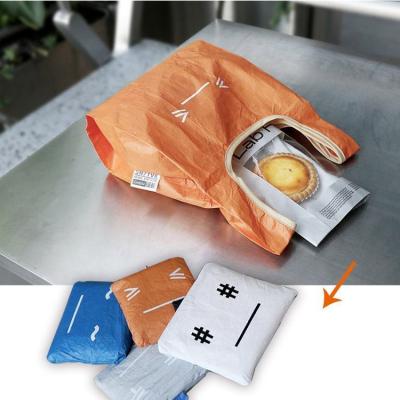 China Custom Tyvek Foldable Shopping Bag Sustainable Singlet Bag, Grocery Bag, T-Shirt Bag, Vest Carrier, Dupont Paper Waterproof Handbag Carrier Wholesale Fashion Lightweight Tyvek Tote Bag for sale
