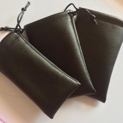 China PU Gold-Stamped Leather Bag, High-Grade PU Spring-Type Automatic Storage Bag, Drawstring Cloth Bag, Coin And Key Storage Leather Bag, Headband-Style Data Cable Storage Bag for sale