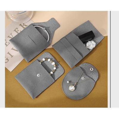 China Fashionable Energy Customized LOGO Gray Flannel Bag Thickened Snap Cloth Bag Microfiber Flannel Ring Storage Jewelry Bag for sale