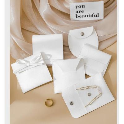 China Customized LOGO White Velvet Bag Jewelry Accessories Thickened Snap Button Bag Anti-Oxidation Jewelry Storage Bag for sale