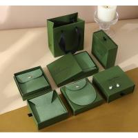 China Batch Customized LOGO Kapok Green Jewelry Storage Drawer Box Velvet Bag Set Light Luxury World Cover Jewelry Packaging Box for sale