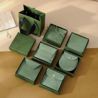 China Batch Customized LOGO Kapok Green Jewelry Storage Drawer Box Velvet Bag Set Light Luxury World Cover Jewelry Packaging Box for sale