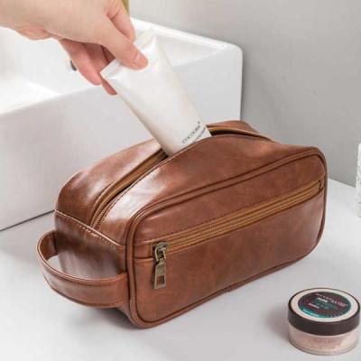 China New Waterproof Pu Leather Mens Toiletry Bag Travel Storage Shaving Bag Dopp Kit Portable Wash Cosmetic Makeup Bag for sale