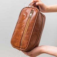 China New Waterproof Pu Leather Mens Toiletry Bag Travel Storage Shaving Bag Dopp Kit Portable Wash Cosmetic Makeup Bag for sale