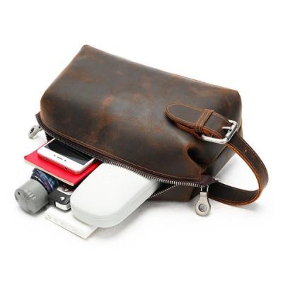 China Crazy horse leather vintage toiletry bag Genuine Leather Woven Clutch Bag Unisex Portable Handheld Storage Bag Leather Large Capacity Toiletry Bag Wholesale for sale