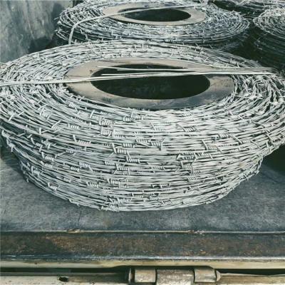 China 12 1/2 GA Hot Dip Galvanized Barbed Wire - 1320' Length with 380-1200 N/mm² Tensile Strength for sale