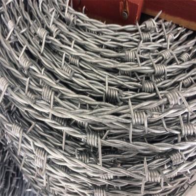 China Heavy Duty Galvanized Barbed Wire 800-1200N/mm² Tensile Strength with 3-6 Inch Barb Spacing for sale