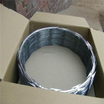 China Hot Dip Galvanized Razor Barbed Wire BTO-22 - 450m × 25kg Coils with 0.4mm Thickness and 2.5mm Wire Diameter for sale