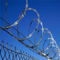 China Galvanized Concertina Razor Wire BTO-22 450mm Coil Anti-Climb Security Fence for sale