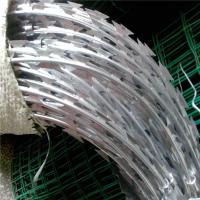 China Galvanized Concertina Razor Wire BTO-22 450mm Coil Diameter 15m Length Anti-Climb Security Fence for sale