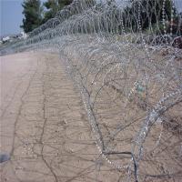 China Galvanized Concertina Razor Wire BTO-22 450mm Coil Diameter Anti-Climb Security Fence for sale