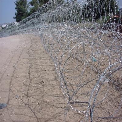 China Galvanized Concertina Razor Wire BTO-22 450mm Coil Diameter Anti-Climb Security Fence for sale