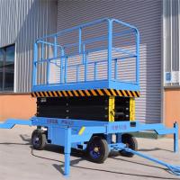 China 6m 8m 12m 230kg Elevated Work Platform Self Propelled  Scissor Lift Table Inter-lock Door On Platform for sale
