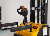 China 1.5ton 6000mm Heavy Duty Standing On Full Electric Stacker for Warehousing and Distribution for sale