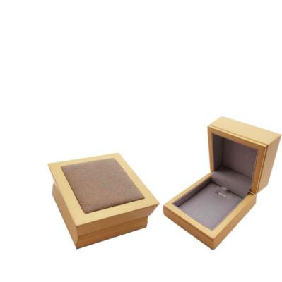 China Elegant Lacquer Finish Wooden Jewelry Box with Custom PU Leather Interior - Square Design for Earrings and Necklaces for sale