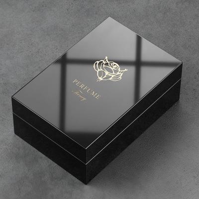 China Custom Logo Luxury Perfume Box with EVA Inner Tray Precision Fit and Multi-Layer Solid Wood Construction for sale