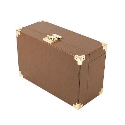 China Custom Black Leather Perfume Gift Box Set Hollow Carved Gold Foil Stamping Embossed Logo Packaging for sale