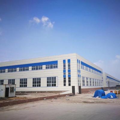 China PEB Steel Buildings manufacturing workshop providing painting solutions to protect against rust and environmental impact for sale