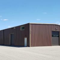 China 75 Sandwich Panel Thickness Steel Structure Warehouse Equipped with H Steel Main Steel Frame and 50 Years Structural Providing Storage Space for sale