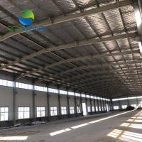 China AISC/EN/JIS/GB Steel Warehouse Structure Building Design with H Section Steel Beam Rolling Door for sale