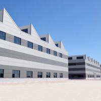 China Economical Large Span Prefabricated Metal Warehouse Durable Steel Structure Office Building Aircraft Hangar for sale