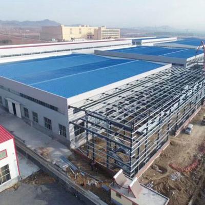 China Low cost China Factory Customized Prefabricated Metal Building Kits Workshop Welding Steel Structures Warehouse Building for sale