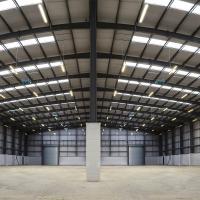 China Customizable Steel Structure Warehouse offering spacious and durable solutions for industrial production lines and equipment storage needs for sale